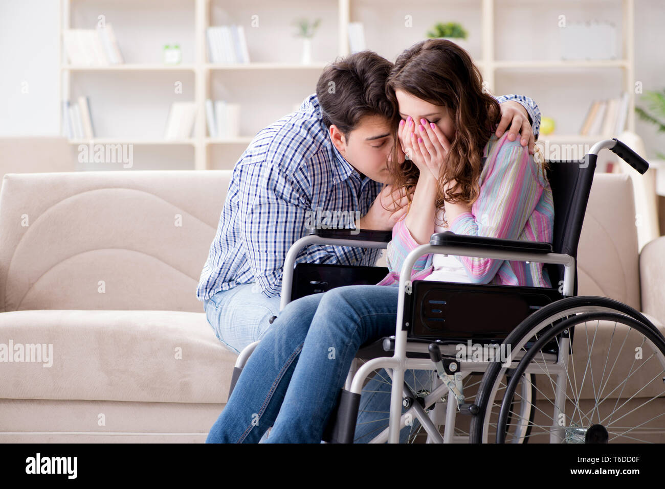 Desperate disabled person on wheelchair Stock Photo - Alamy