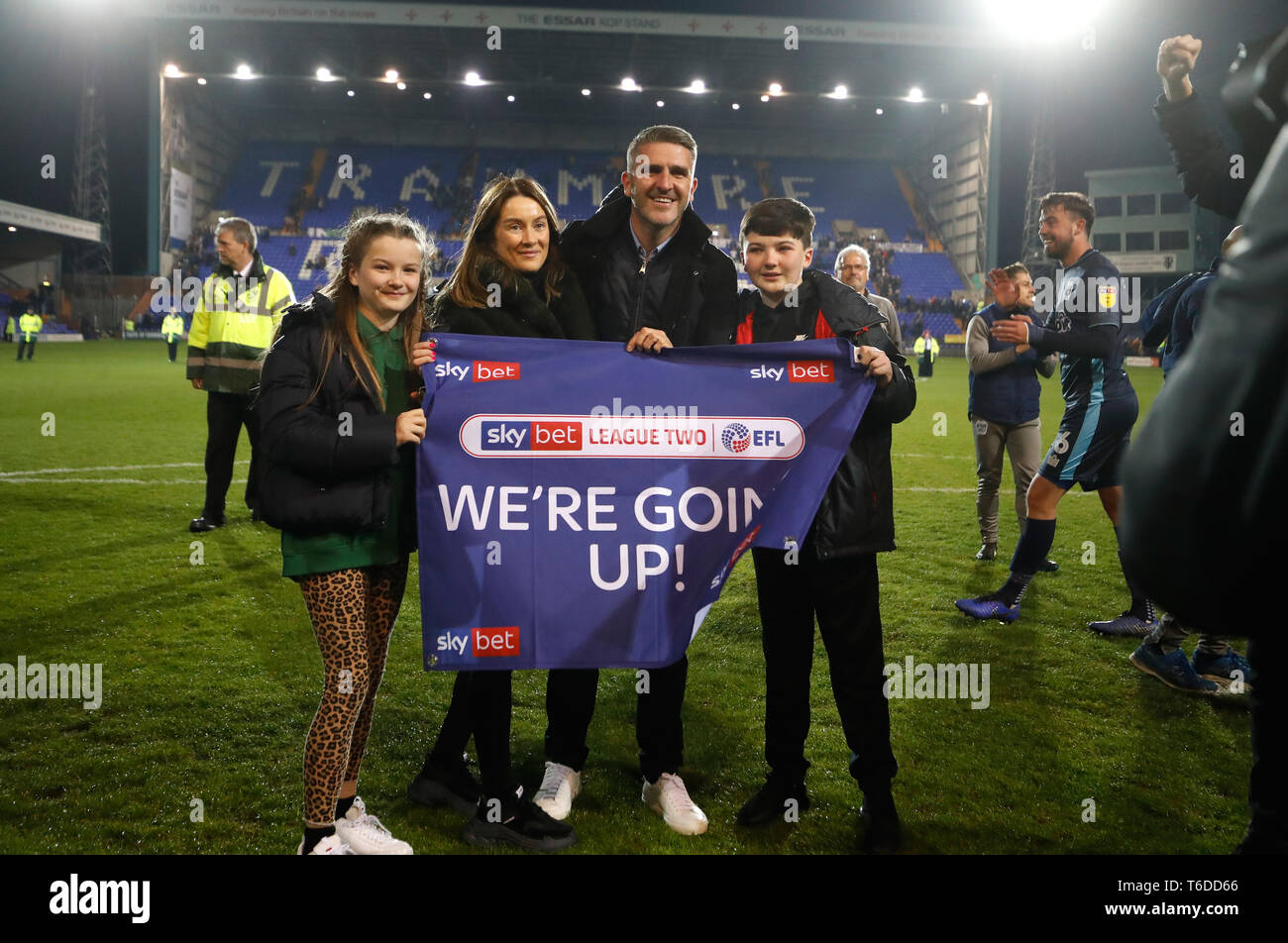 Bury manager Ryan Lowe and family celebrate promotion during the Sky ...