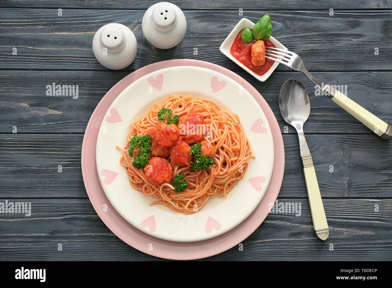 Plate with spaghetti and meatballs on table. Delicious pasta recipes ...