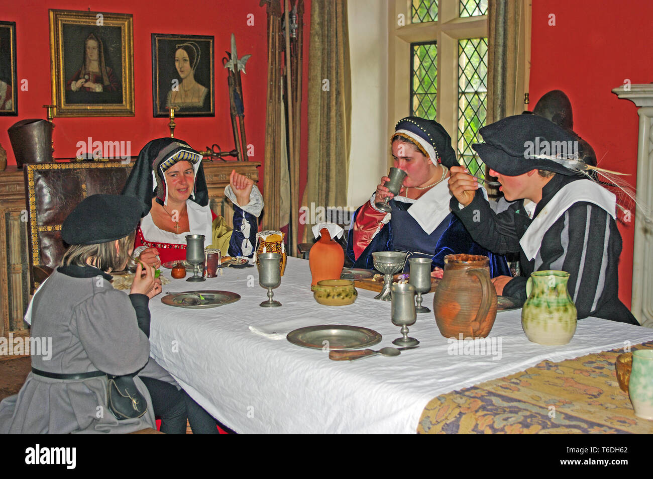Tudor Lord of the Manors Famerly and Friends at Dinner Table ...