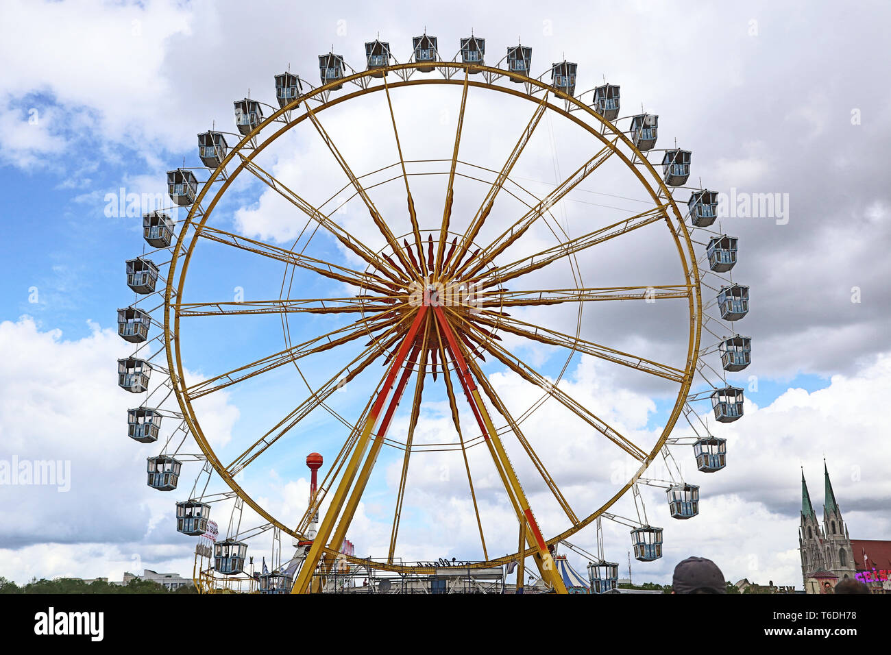 MUNICH, GERMANY - Giant ferris wheel with Bavarian style booths at ...