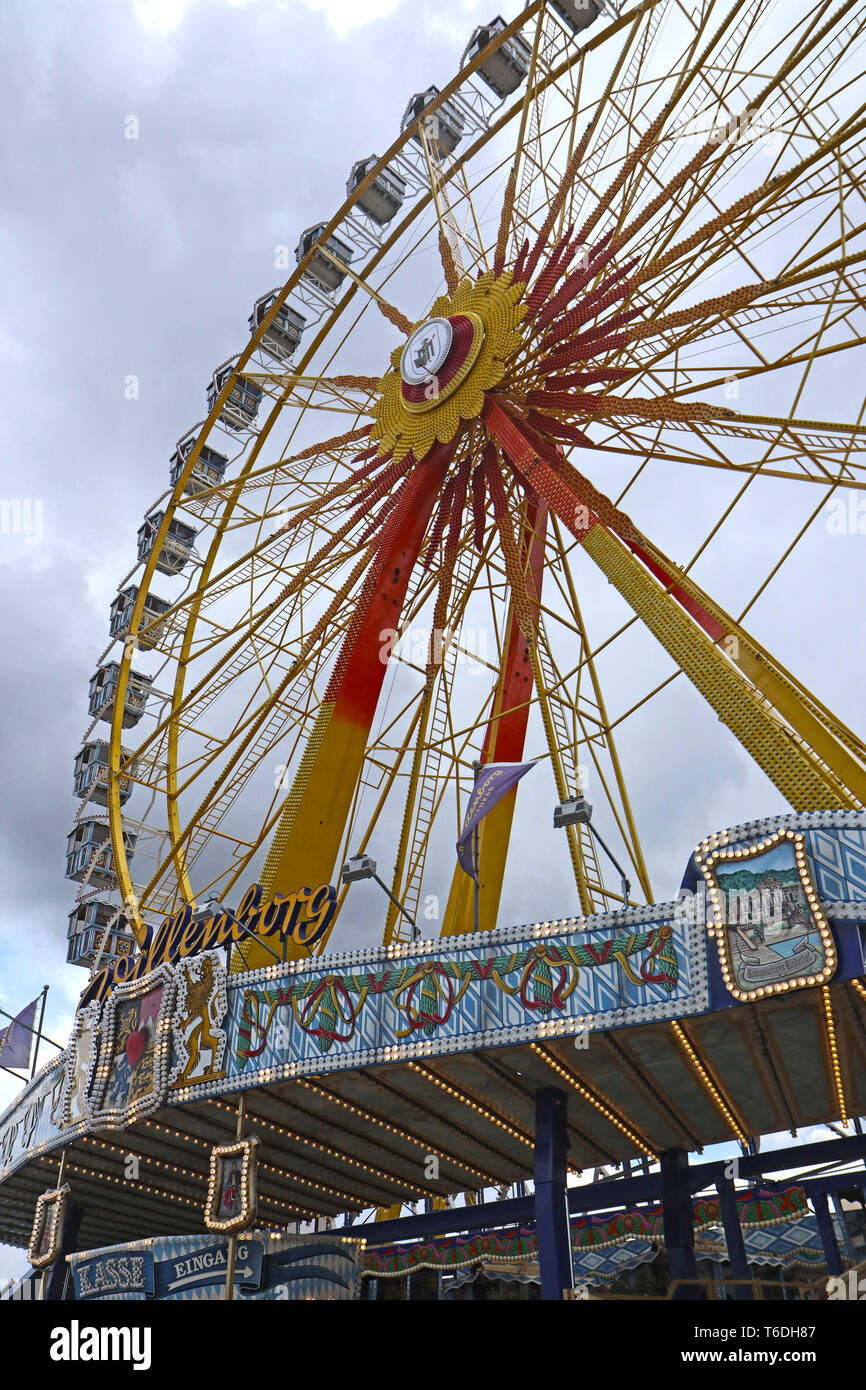 MUNICH, GERMANY - Giant ferris wheel with Bavarian style booths at ...
