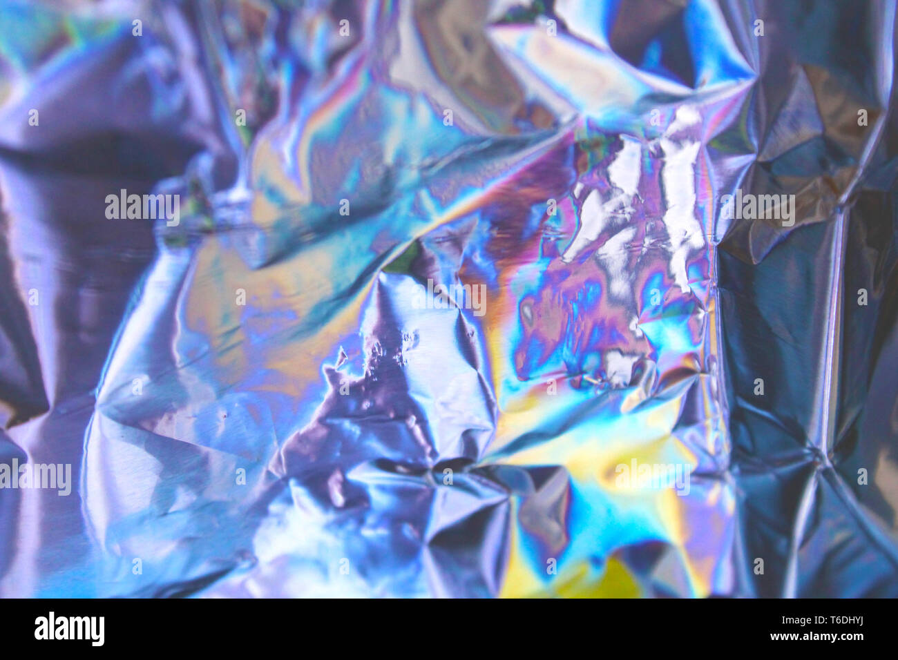 Holographic iridescent foil texture background. It can be used for ...