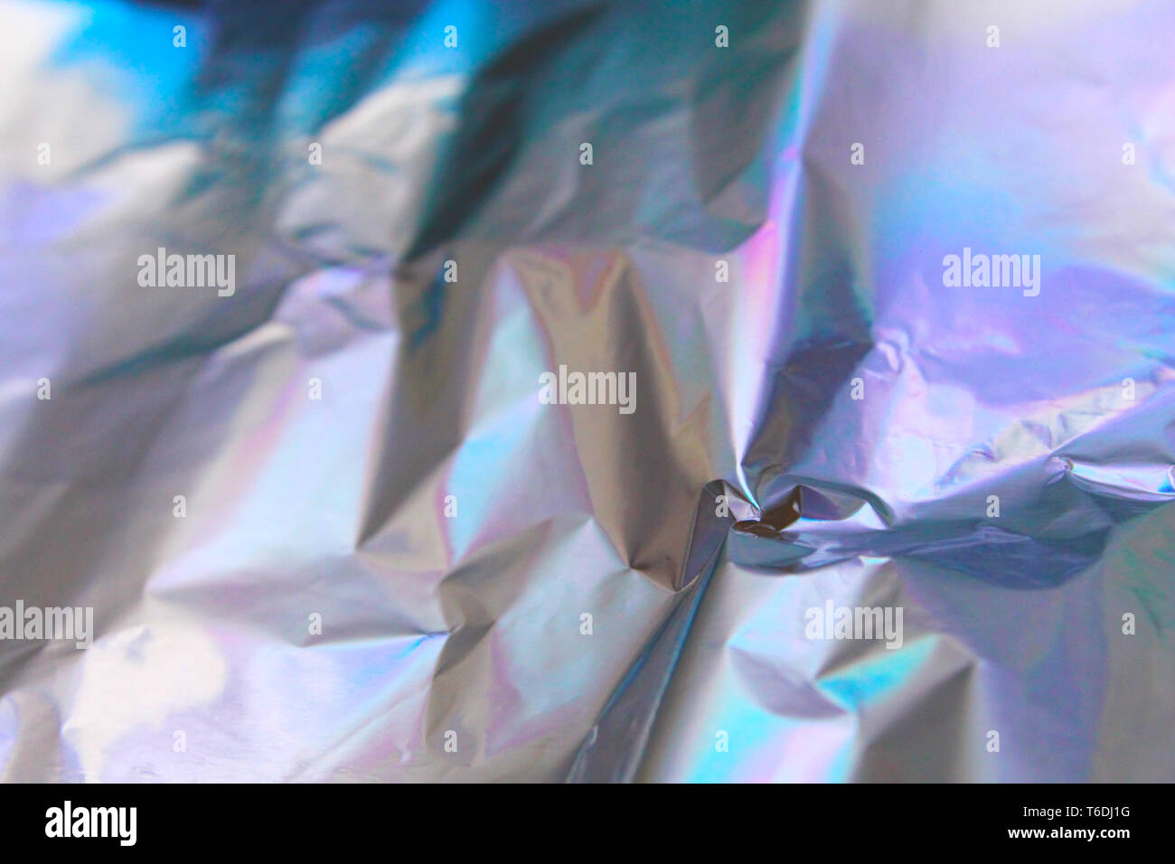 Holographic iridescent foil texture background. It can be used for ...