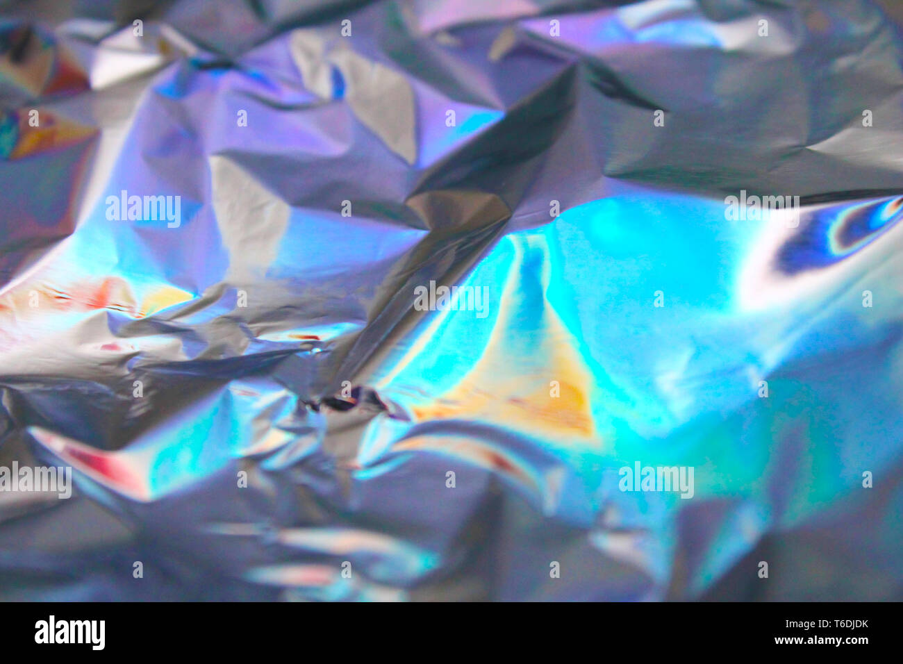 Holographic iridescent foil texture background. It can be used for ...