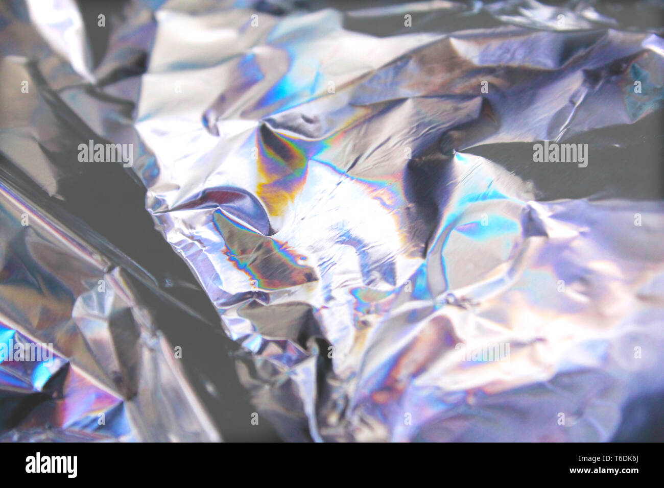 Holographic iridescent foil texture background. It can be used for ...