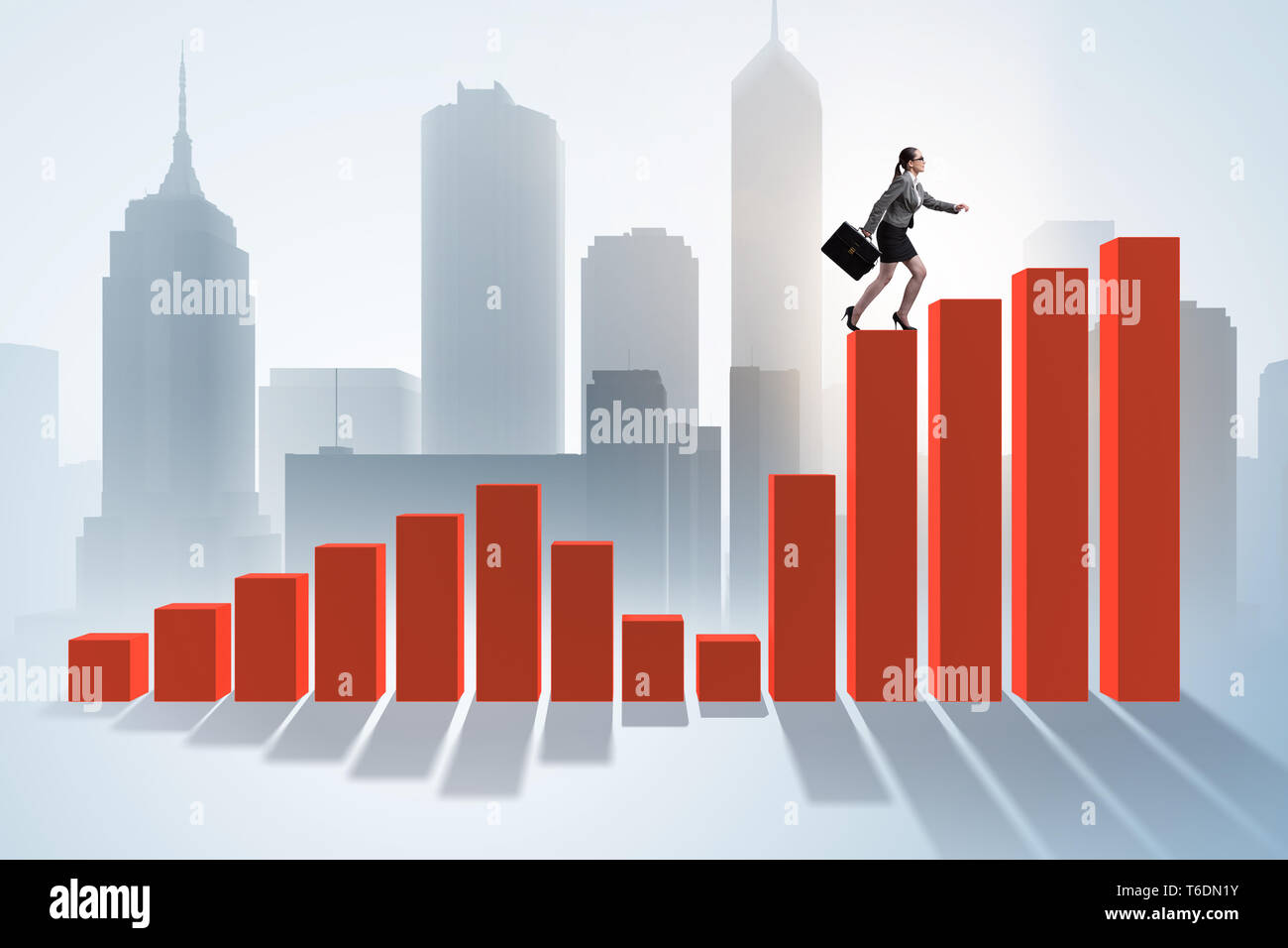 Businesswoman climbing bar chart in economic recovery concept Stock ...