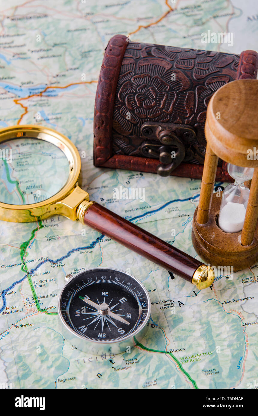 Travel concept with compass and map Stock Photo - Alamy