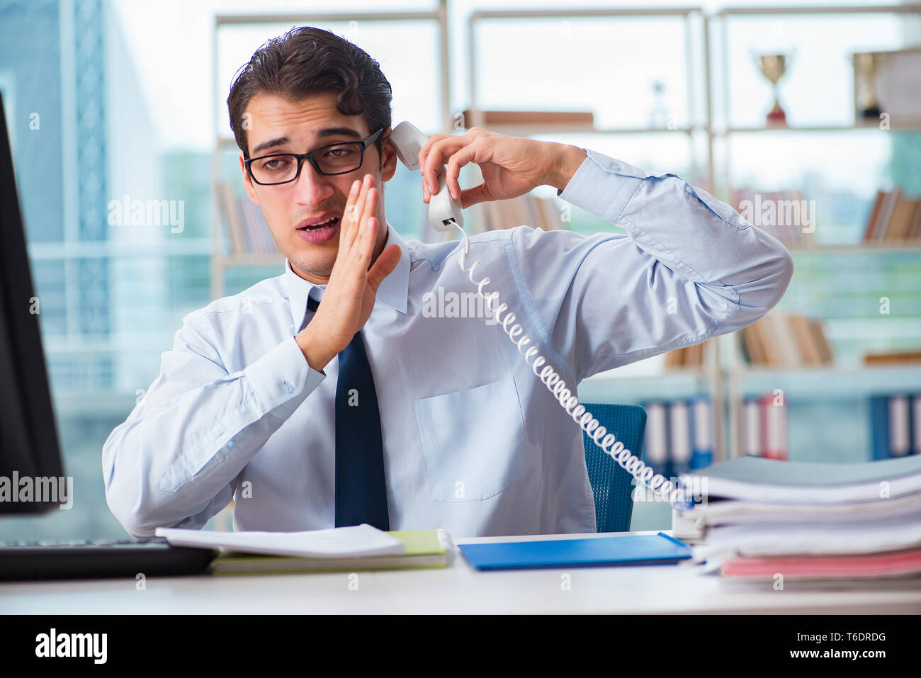 Businessman suffering from excessive armpit sweating Stock Photo - Alamy