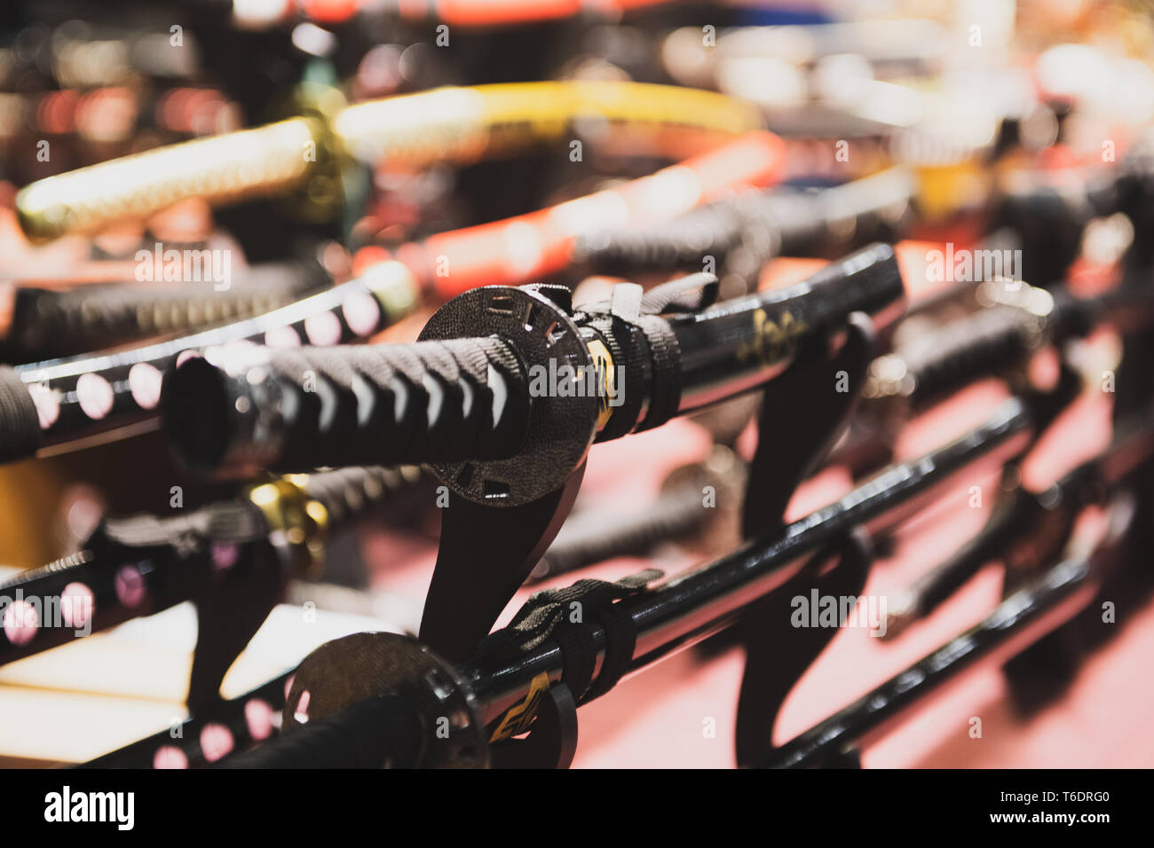 Detail of katana sword handle exhibition in shop shelf Stock Photo - Alamy