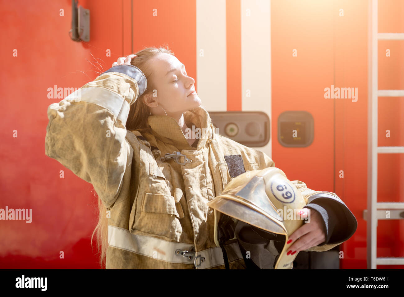 Beautiful woman fire extinguisher hi-res stock photography and images ...