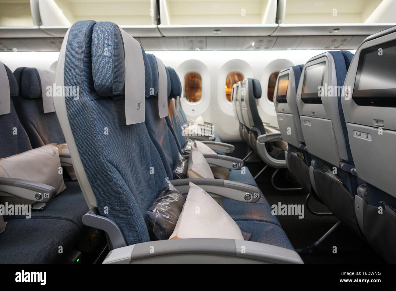 Royal Brunei Airlines Interior flight seating Stock Photo - Alamy