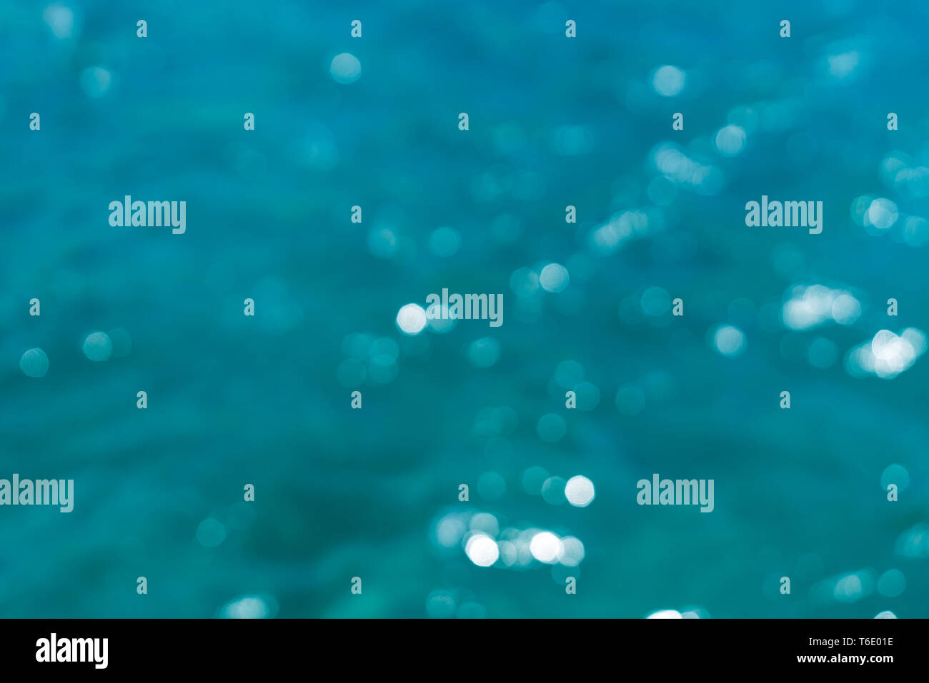 blurry reflections on ocean surface for backgrounds Stock Photo - Alamy
