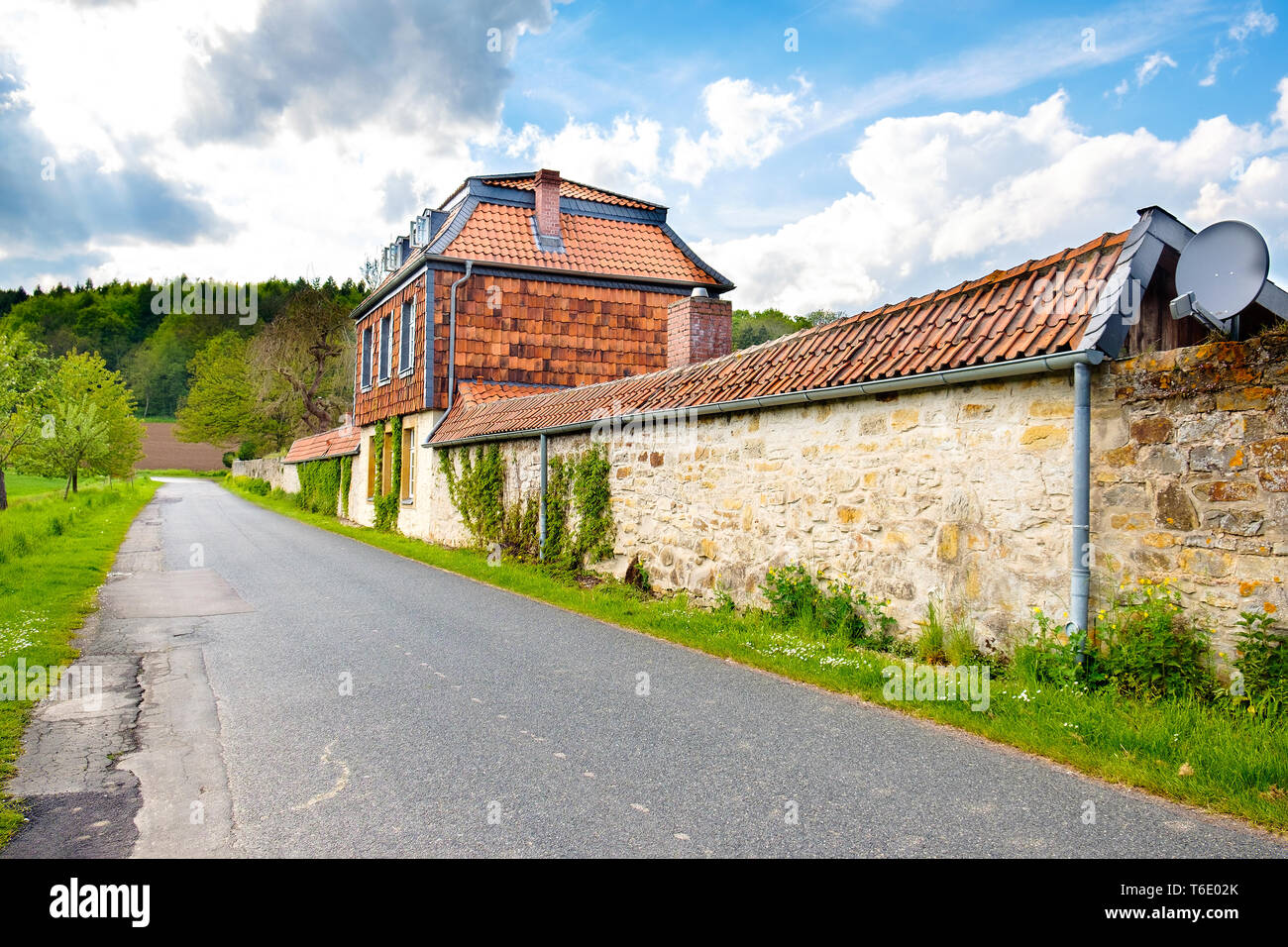 Landscape with old rural house Stock Photo - Alamy
