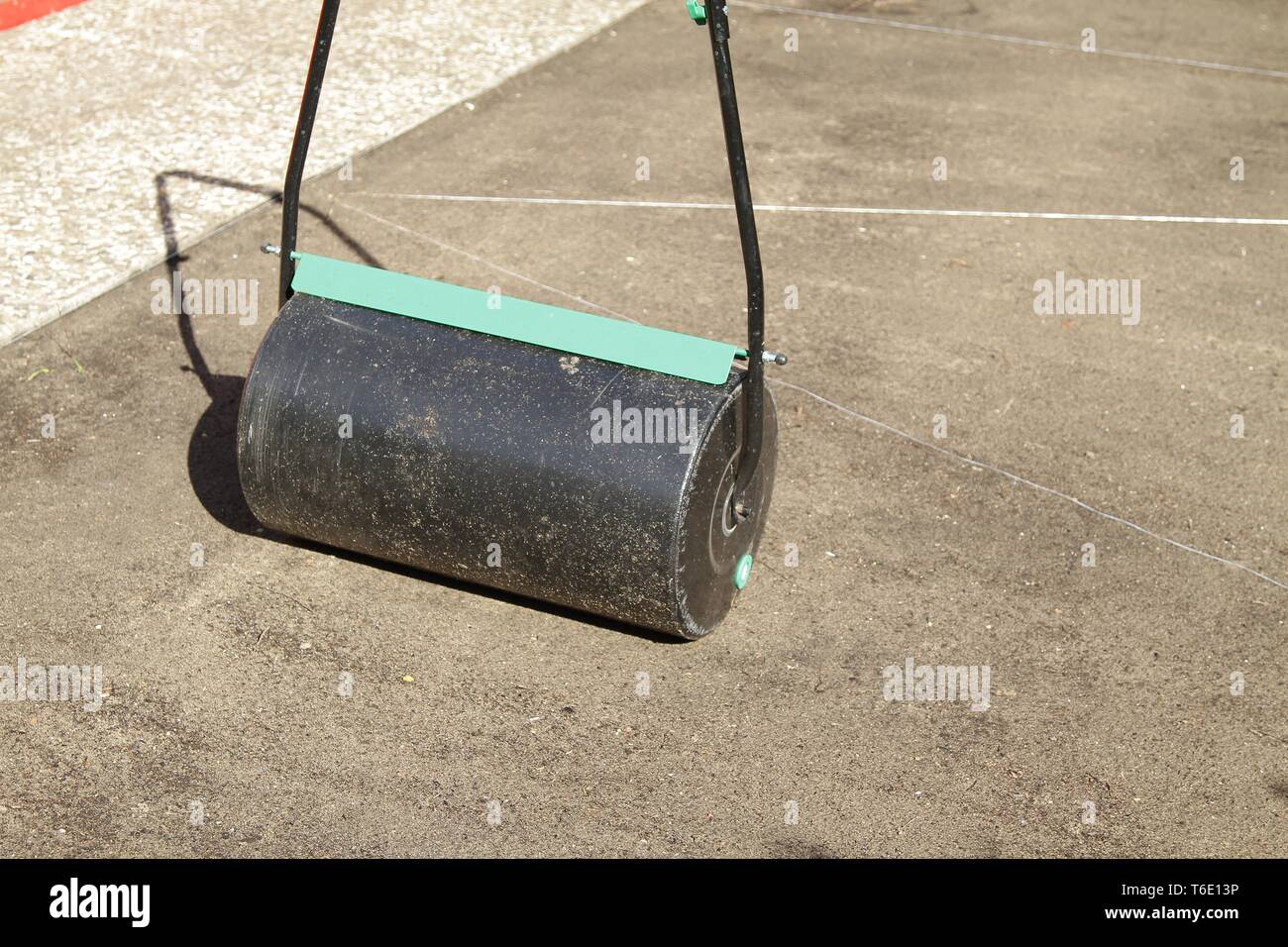 rolled ground for turf in the garden Stock Photo - Alamy