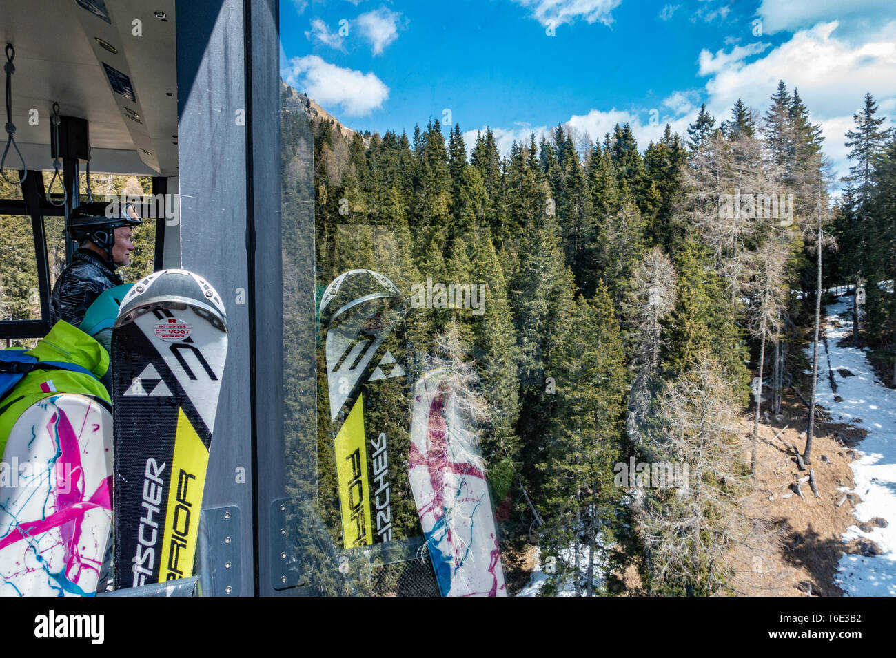 Reflections of skis through a cable car window Stock Photo - Alamy