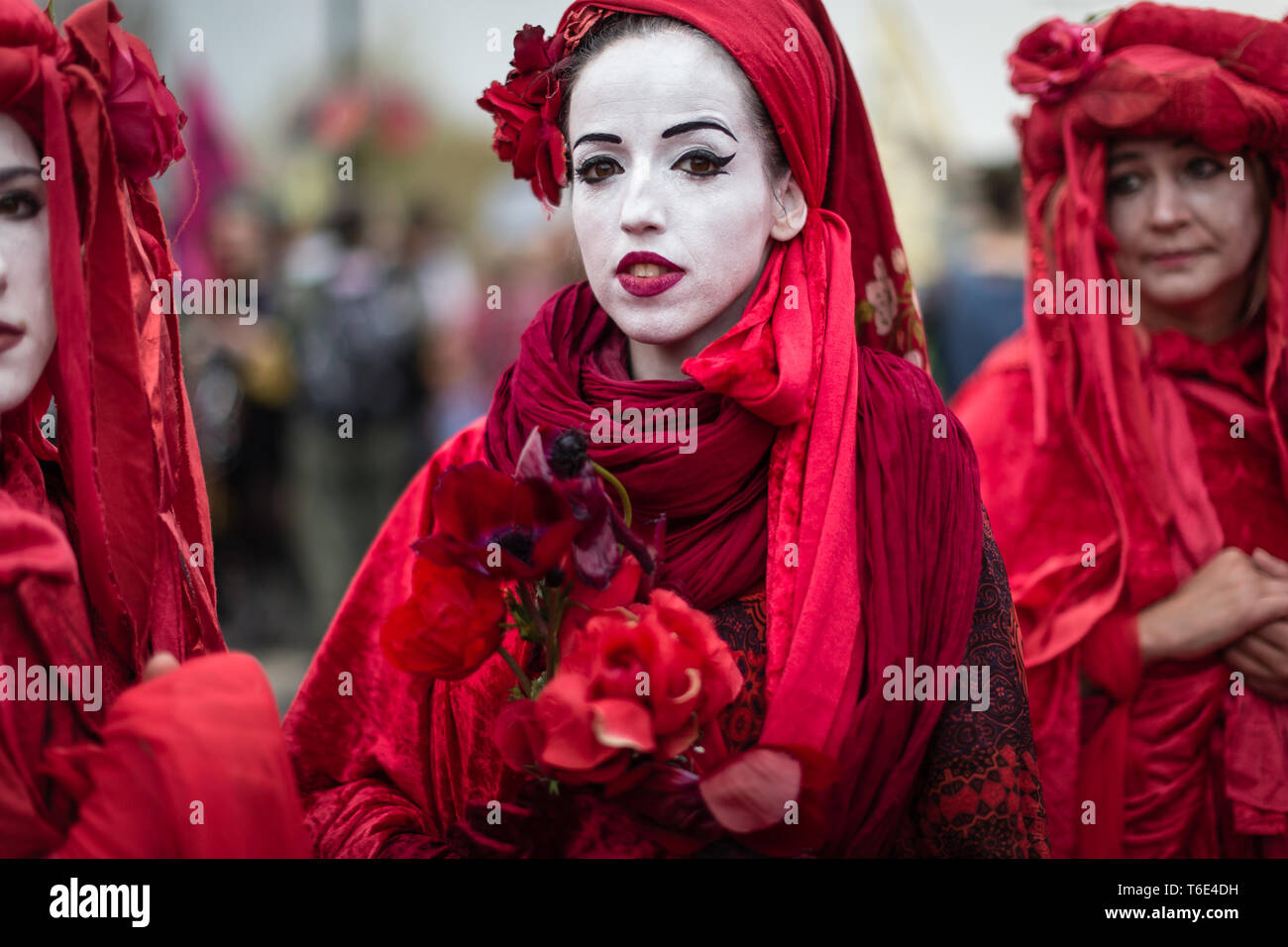 The Red Brigade of Extinction Rebellion on Waterloo Bridge Stock Photo ...