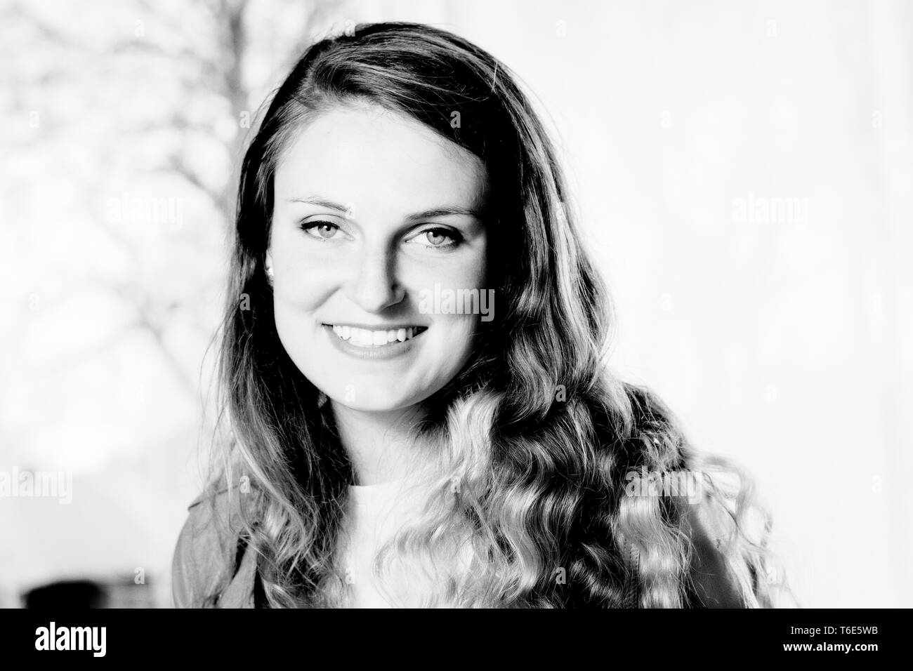 Pretty cheerful caucasian blond woman Black and White Stock Photos ...