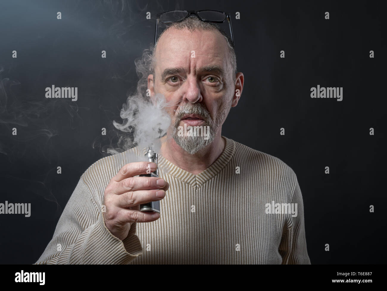 Vaping old man hi-res stock photography and images - Alamy