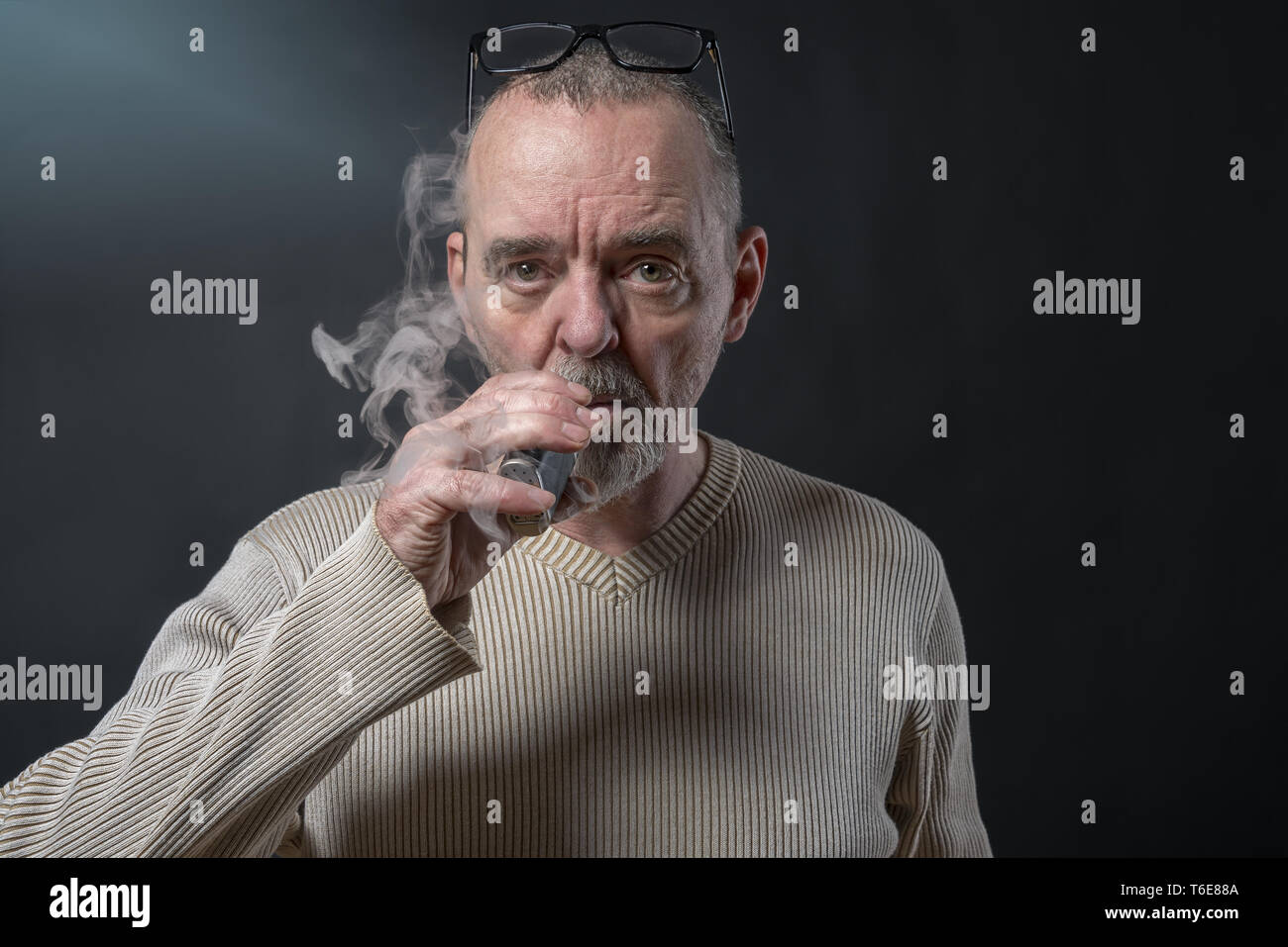 Old man vaping hi-res stock photography and images - Alamy