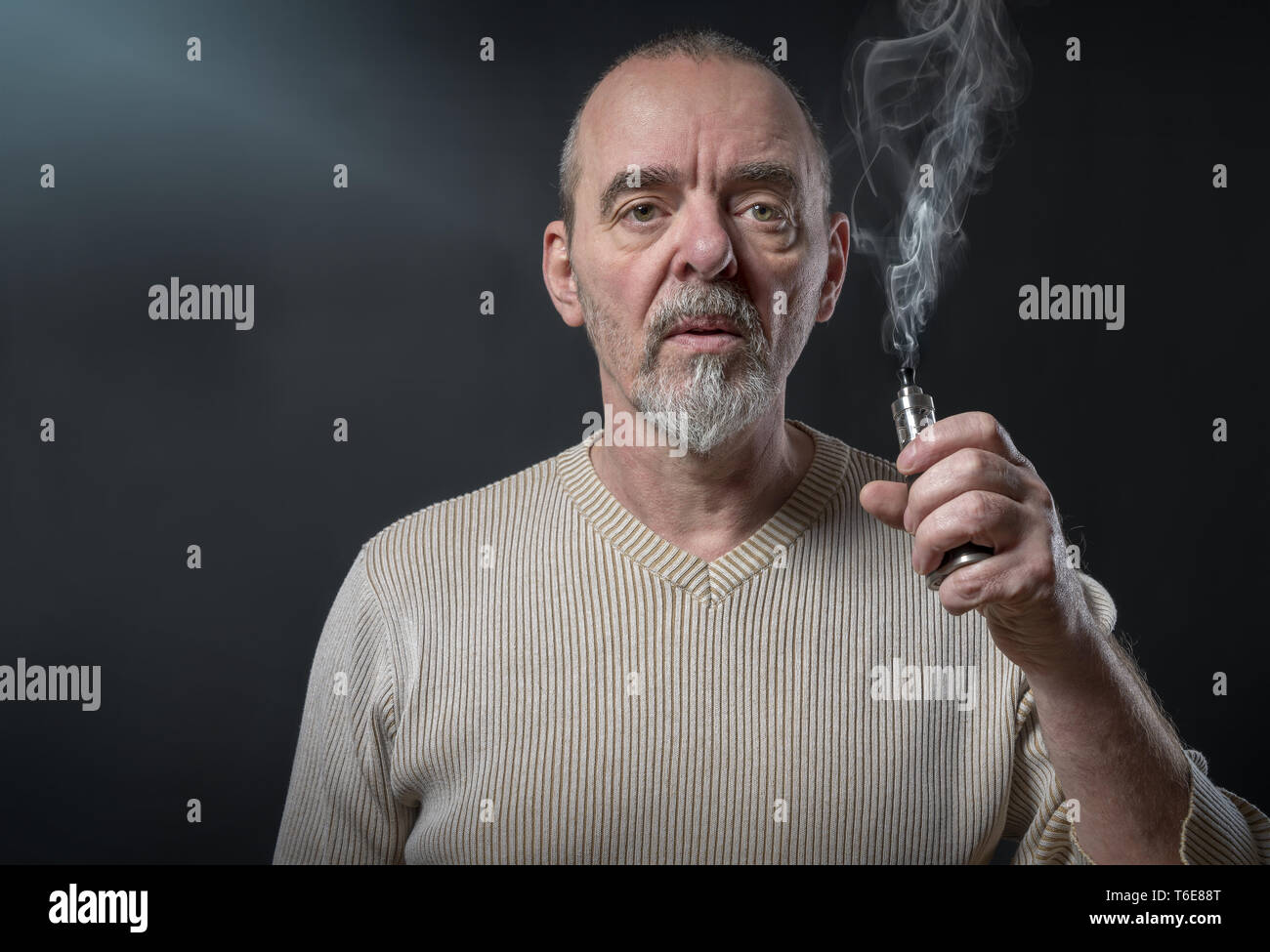 Old man vaping hi-res stock photography and images - Alamy