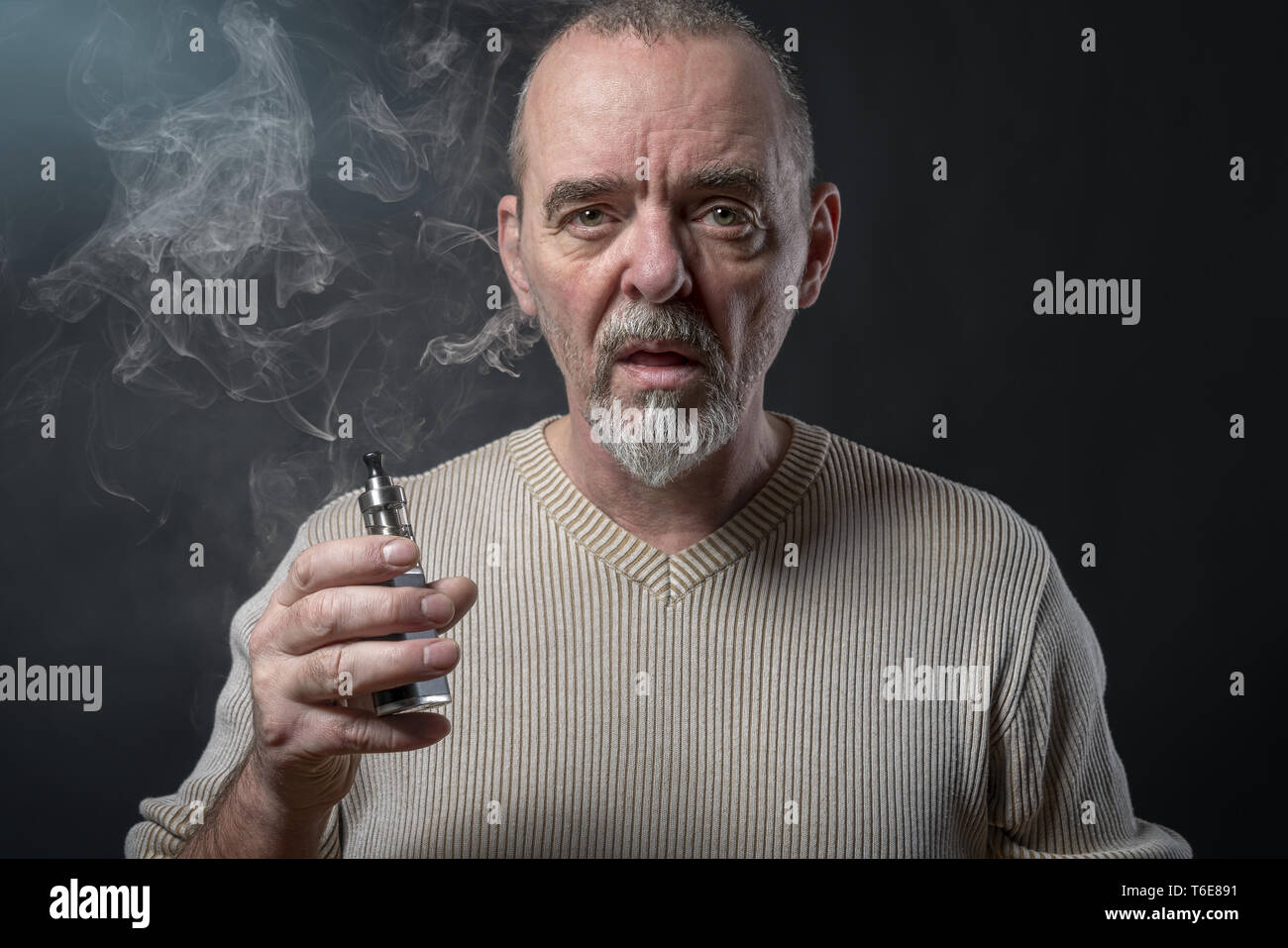 Old man vaping hi-res stock photography and images - Alamy