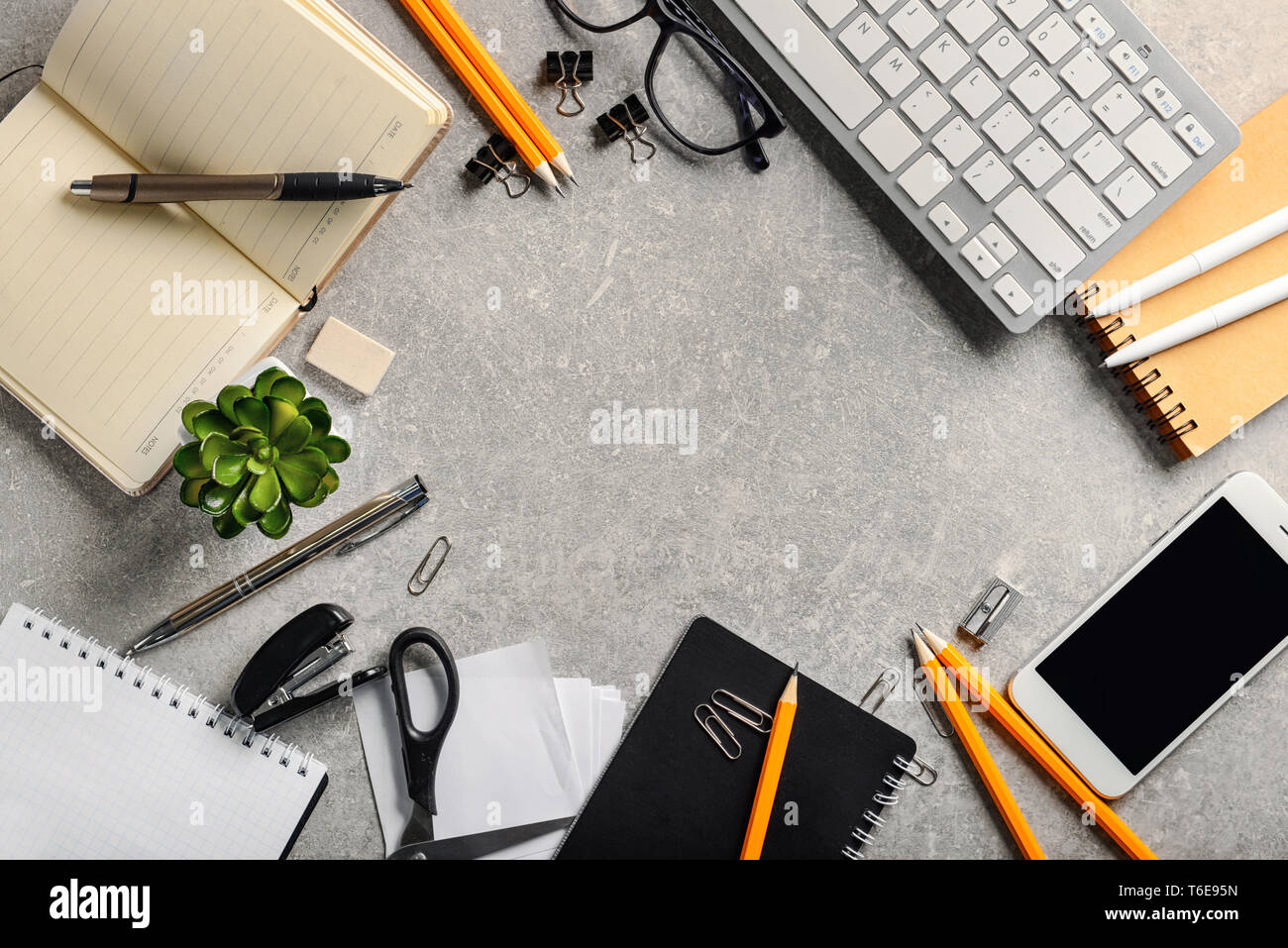 Workplace with stationery, keyboard and phone on table. Top view Stock ...