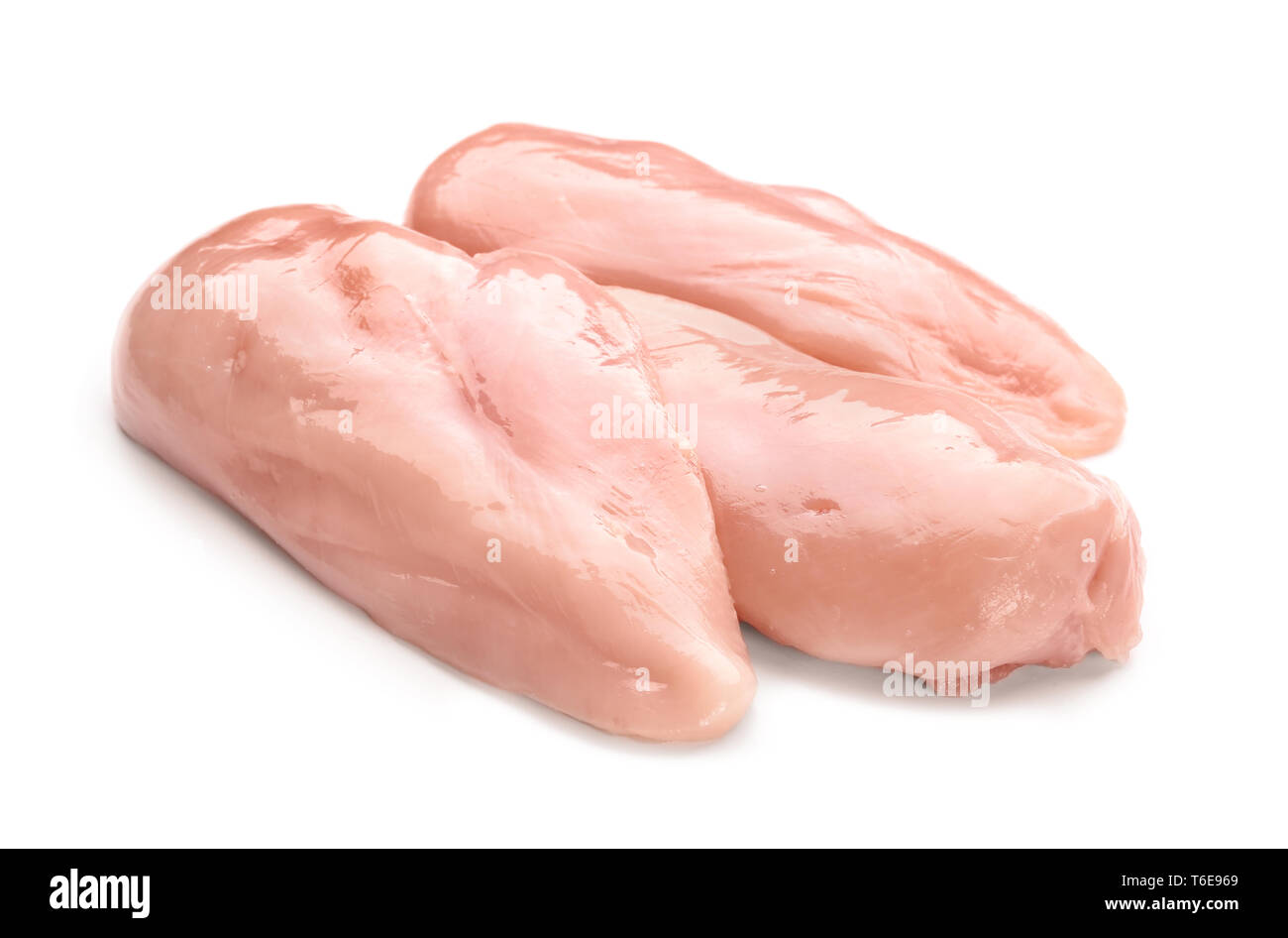 Raw chicken fillet on white background Stock Photo - Alamy