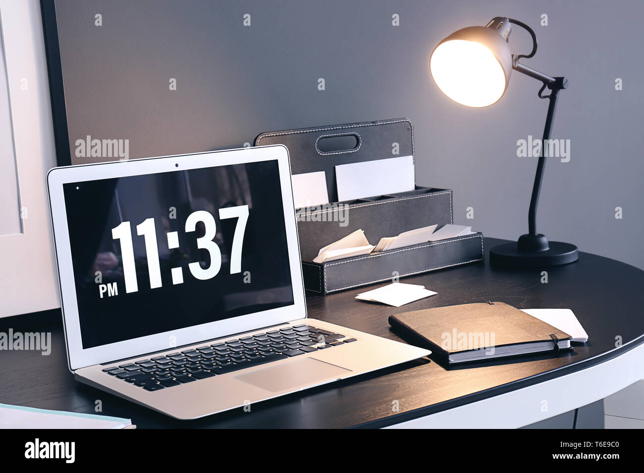 Stylish modern workplace with laptop at home Stock Photo - Alamy