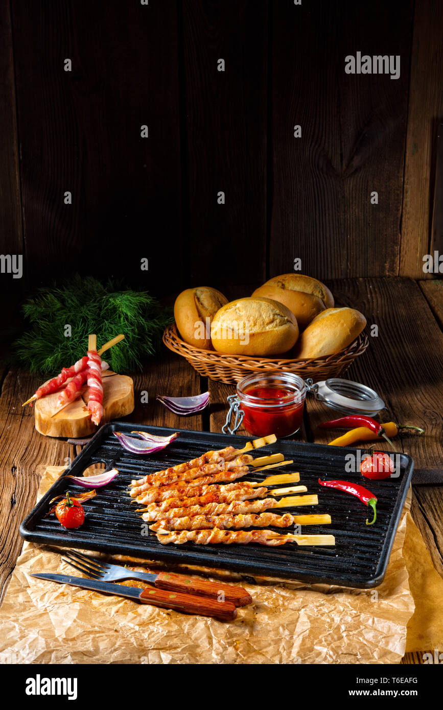 Fresh and crispy rustic pork belly grill sticks Stock Photo - Alamy