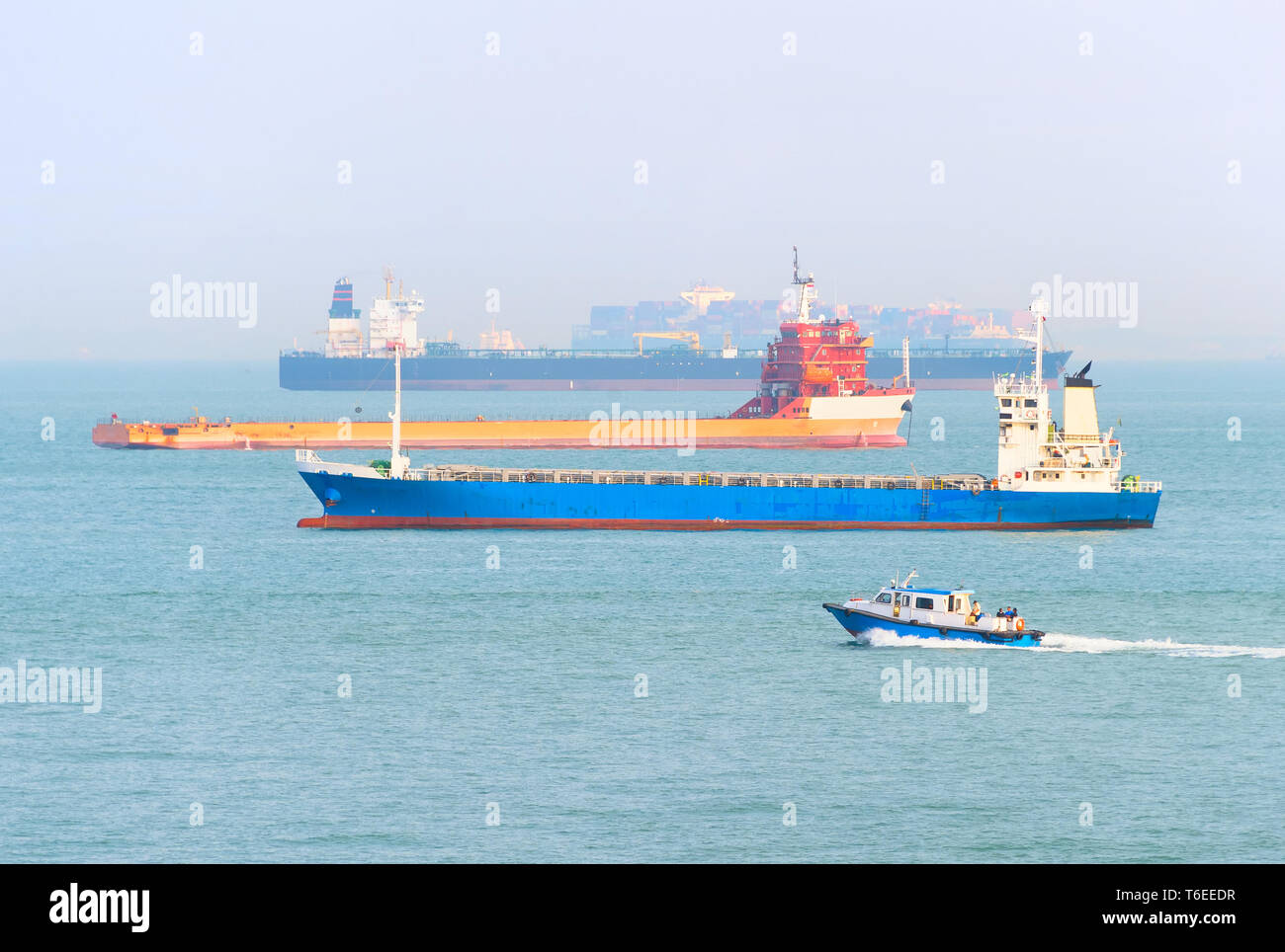 Industrial cargo ships Singapore harbor Stock Photo - Alamy