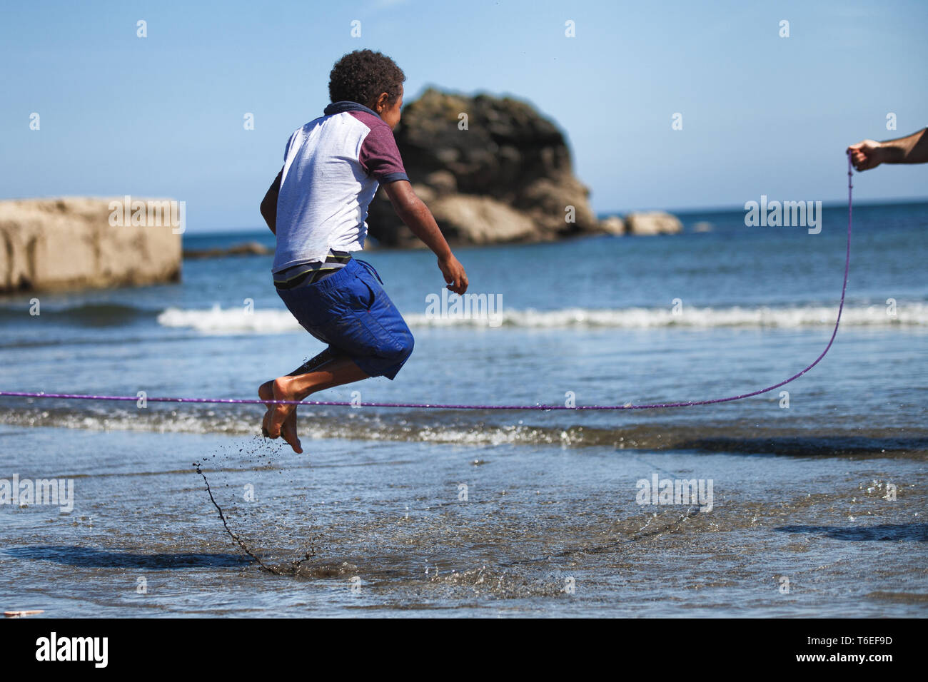 Child hopping hi-res stock photography and images - Alamy