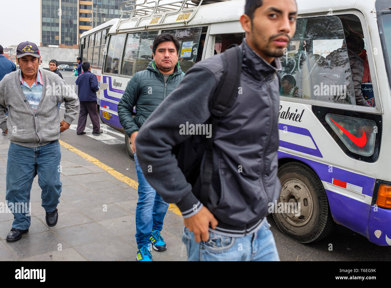 Passengers getting out of the bus in Lima, Peru Stock Photo - Alamy