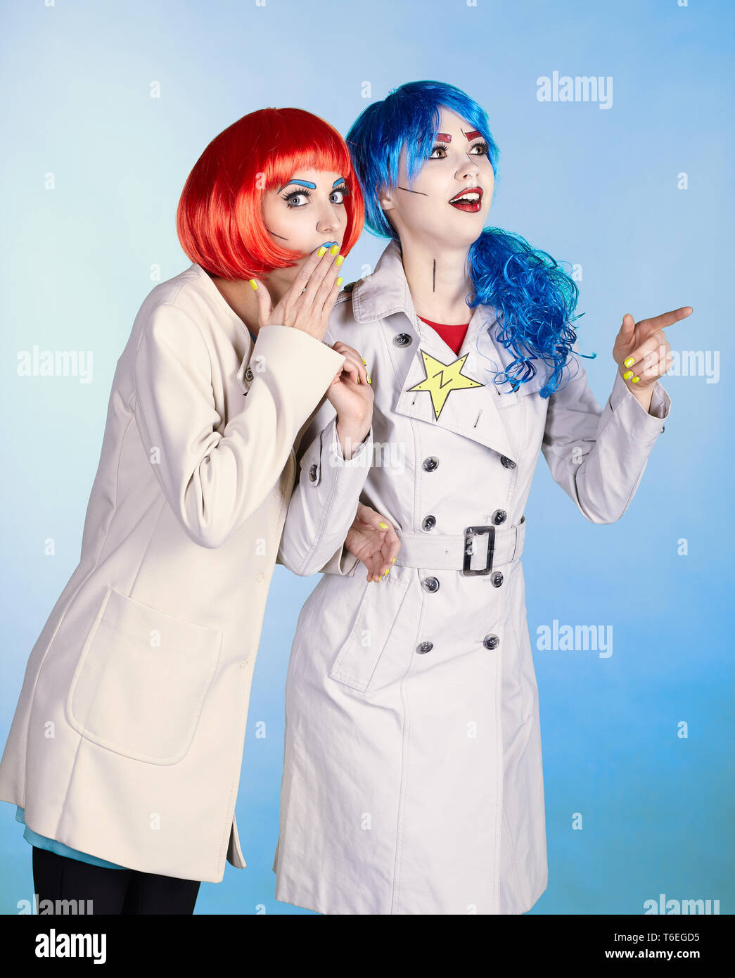 Female detectives investigate a crime. Young women in comic pop art ...