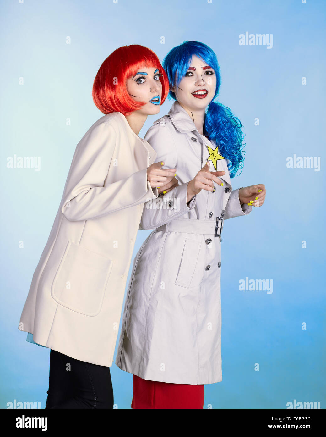 Female detectives investigate a crime. Young women in comic pop art ...