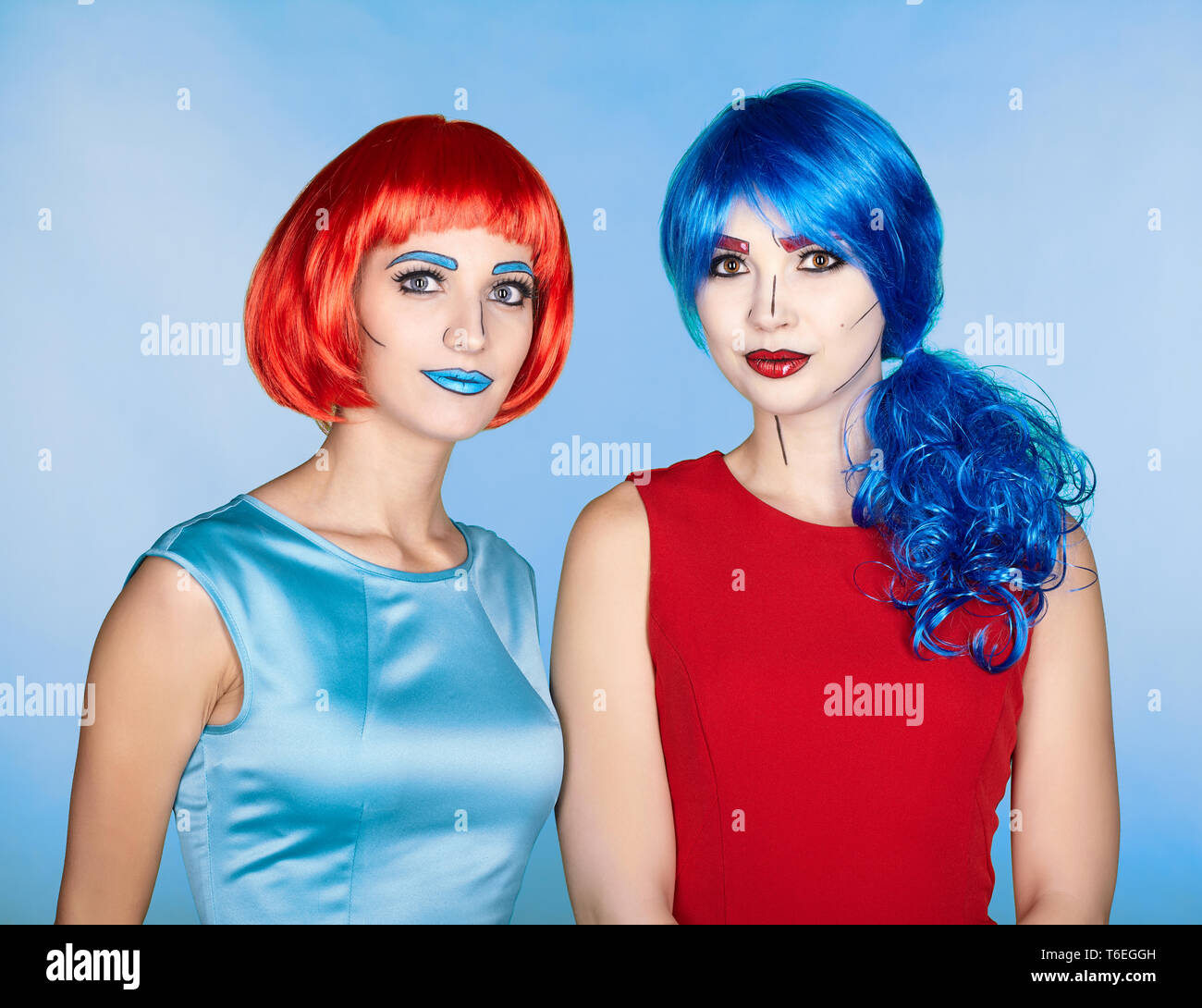 Portrait of young women in comic pop art make-up style. Females in red ...