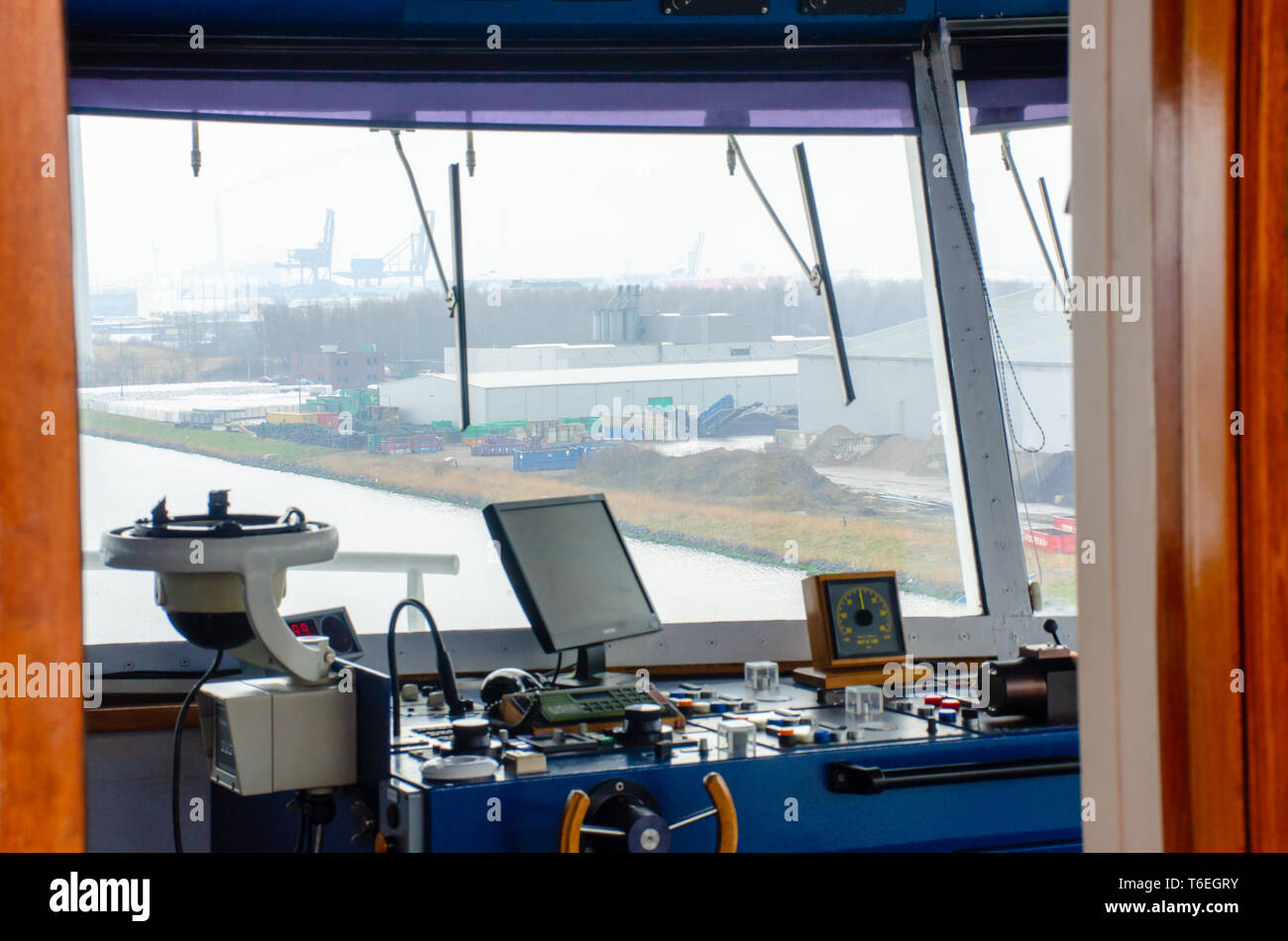 Navigation cockpit on cruise ship cruising down canal Stock Photo - Alamy