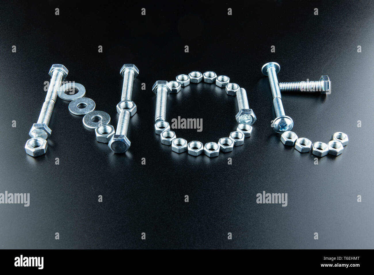 "NOT" created from nuts, bolts and assorted hardware Stock Photo - Alamy