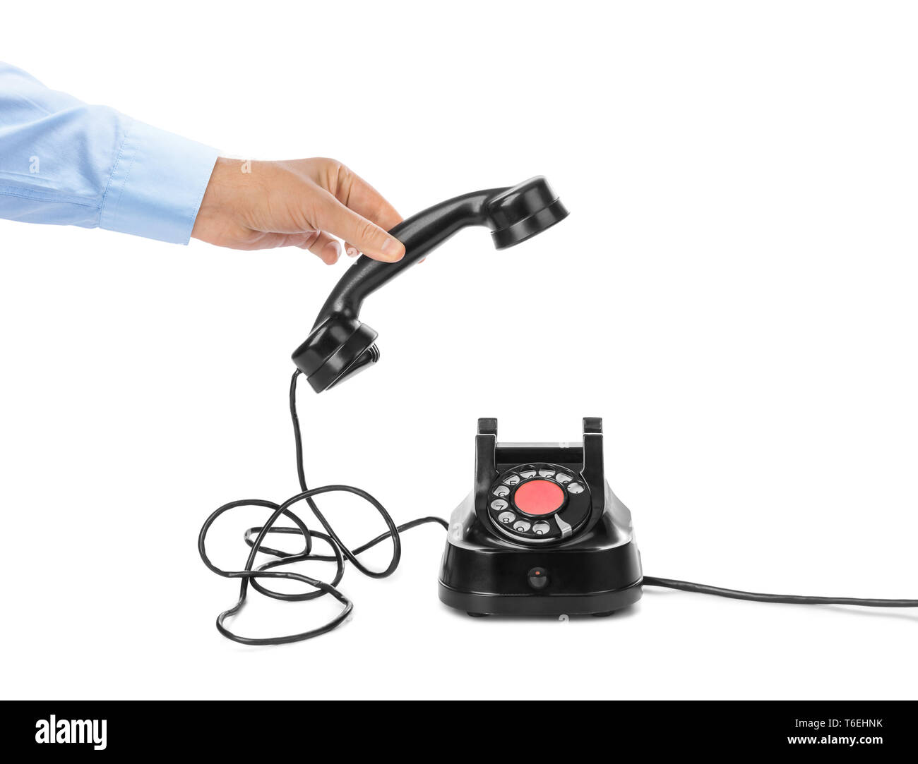 Hand and vintage telephone Stock Photo - Alamy