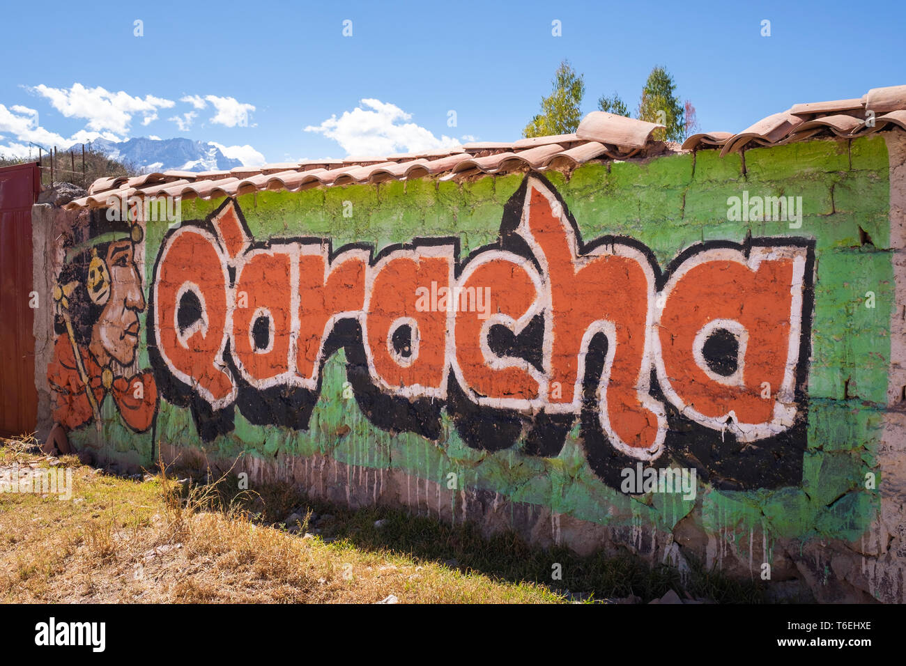 Quechua name Q'aracha painted on a wall near Maras, Peru Stock Photo ...