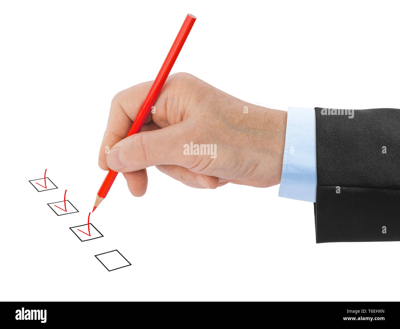 Hand with pencil and check boxes Stock Photo - Alamy
