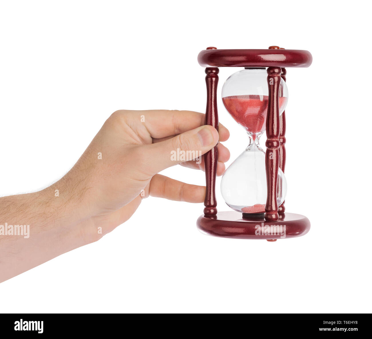Hand with hourglass Stock Photo - Alamy