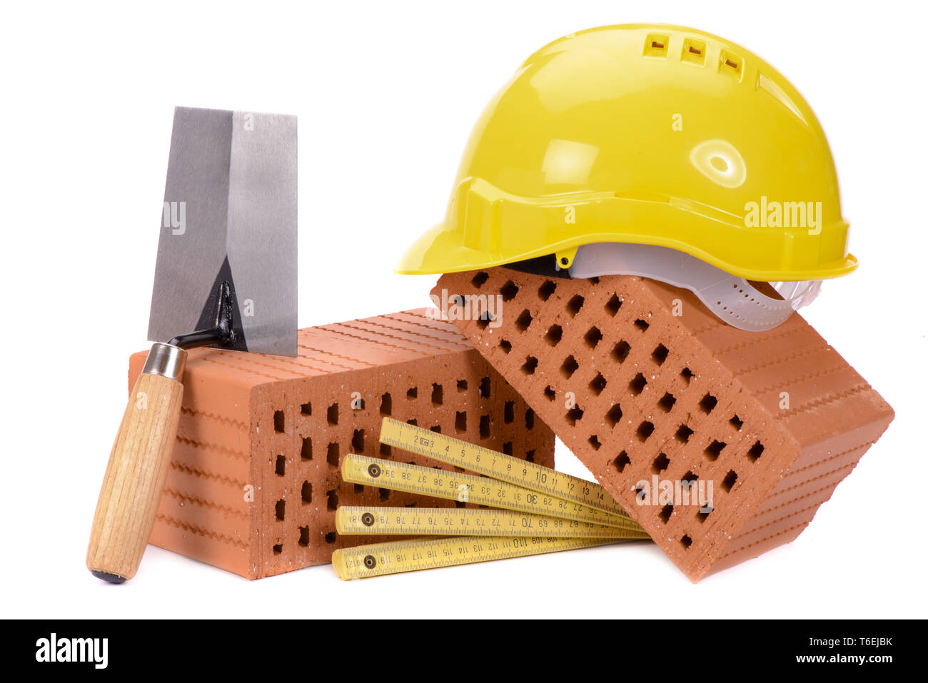 brick for house construction and tools isolated over white background ...