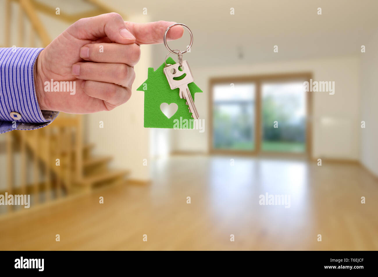 key in hand for new home and real estate Stock Photo - Alamy