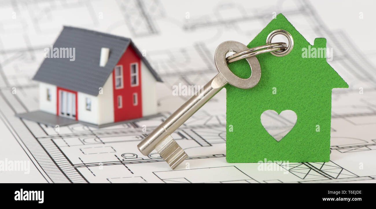 House key in door keyring hi-res stock photography and images - Alamy