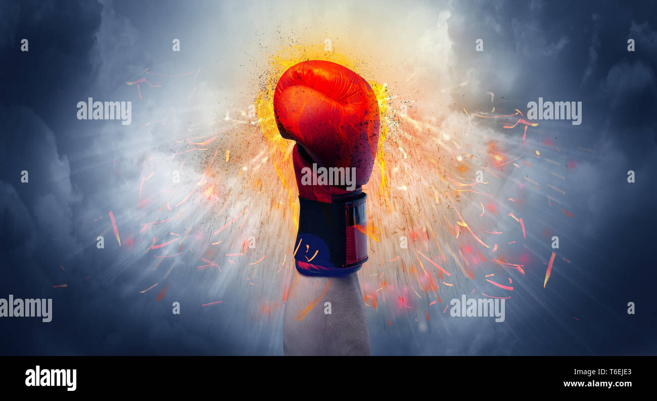 Hand hits strongly and makes fire beam around Stock Photo - Alamy