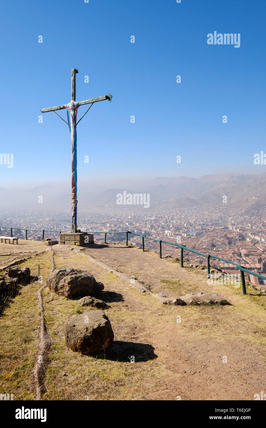 Wooden Christian cross overlooking the historic city of Cusco from ...