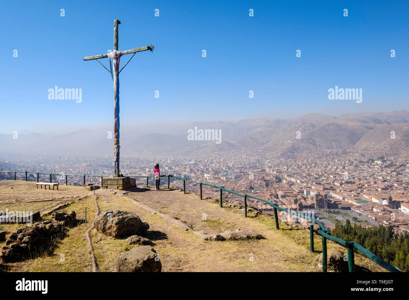 Tourist enjoying a scenic view of the historic city of Cusco from the ...