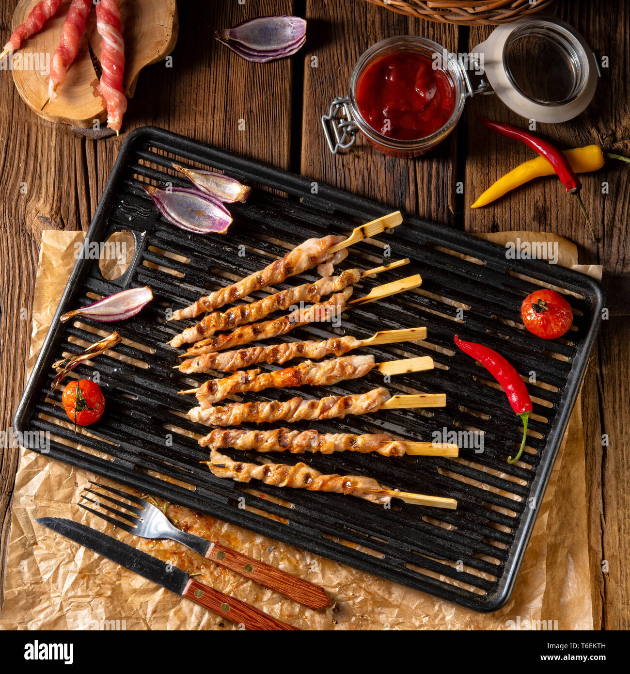 Fresh and crispy rustic pork belly grill sticks Stock Photo - Alamy