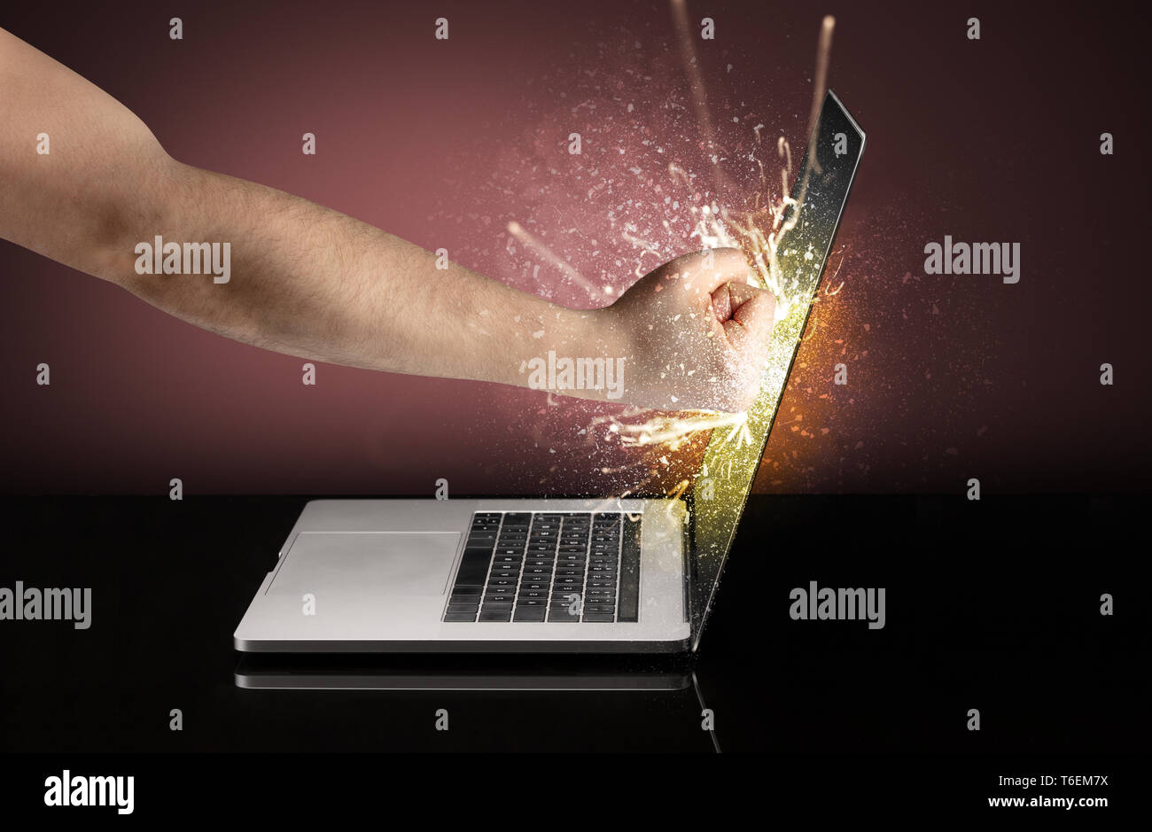 Strong arm boxing laptop screen strongly Stock Photo - Alamy